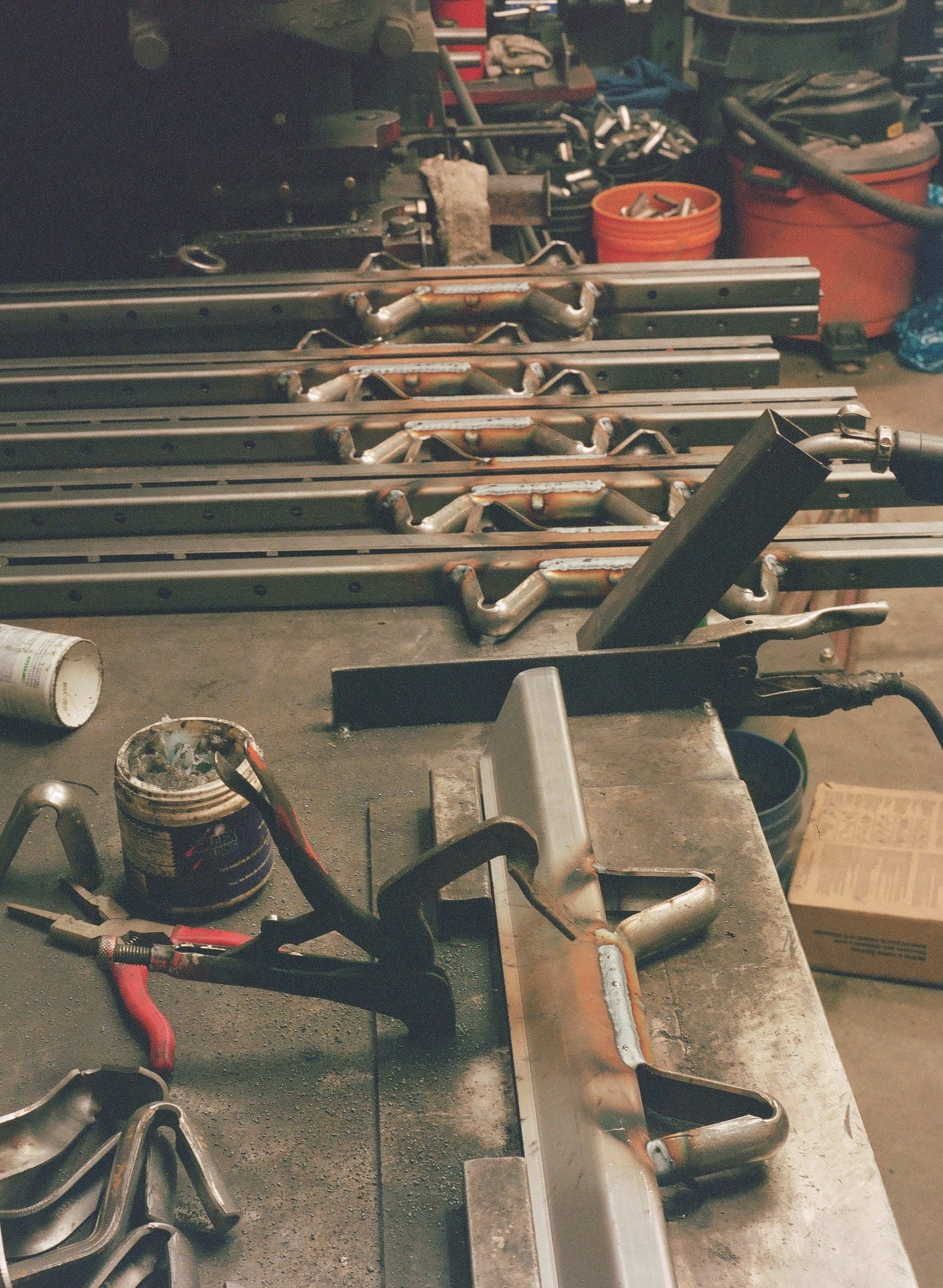 The tire guides and end plates are then welded to the cleat