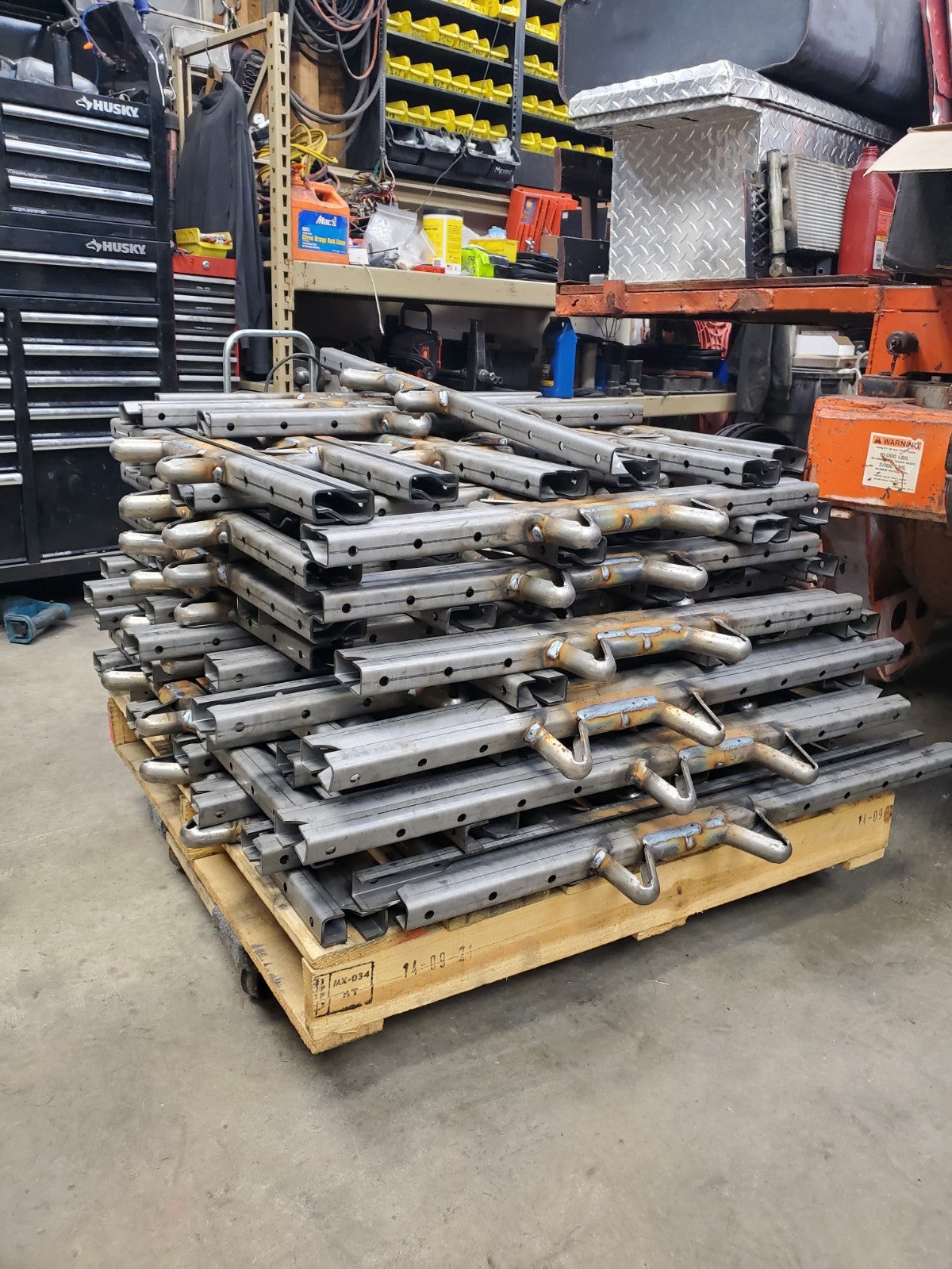 The tire guides and end plates are then welded to the cleat