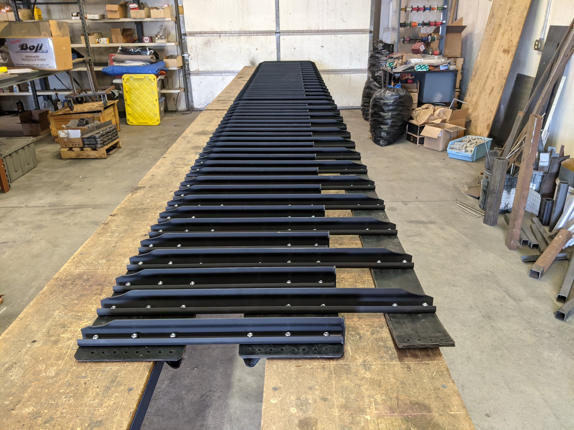 the cleats are dipped in paint and the tracks assembled.