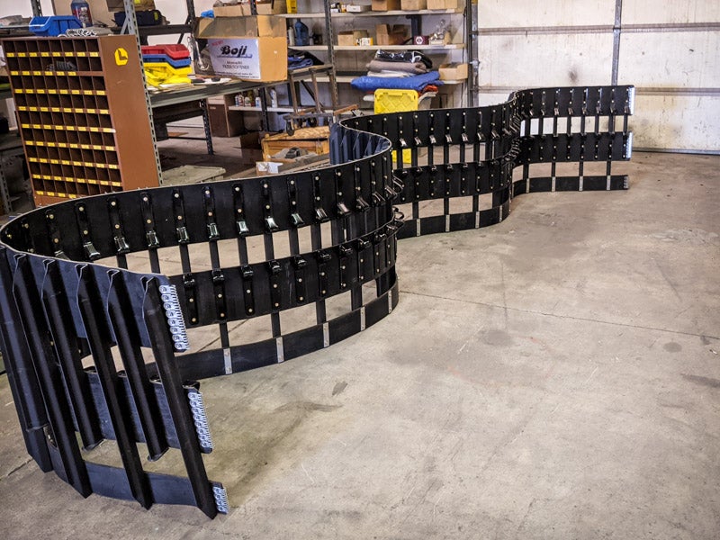 the cleats are dipped in paint and the tracks assembled.